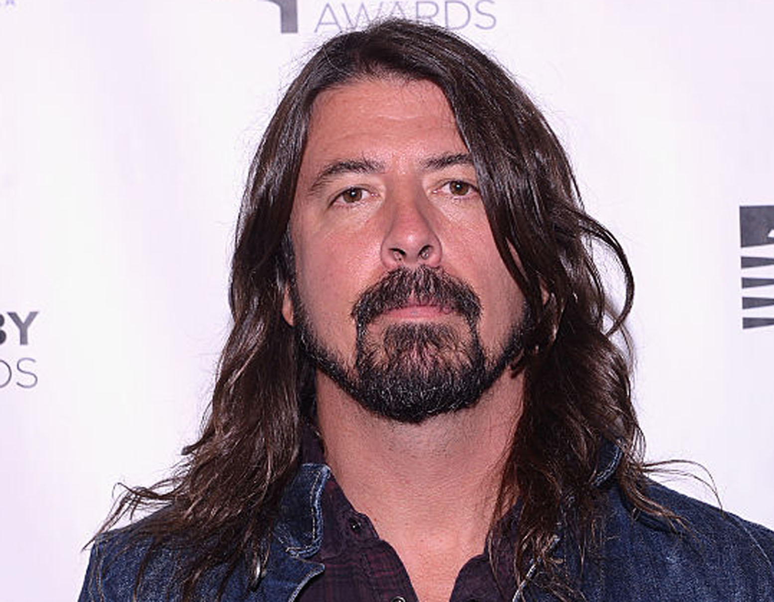 Dave Grohl fra The Foo Fighters er pappa igjen - men ikke via kona - 730.no